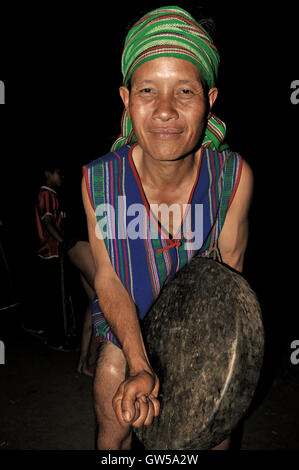 Phnong Village - celebration in traditional clothes, drinking rice wine ...