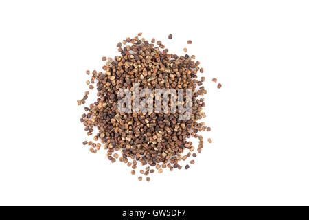 Decorticated cardamom seeds pile on a white background Stock Photo - Alamy