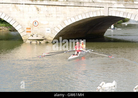 Double skull rowing boat approaching the Town Bridge in Bedford ...