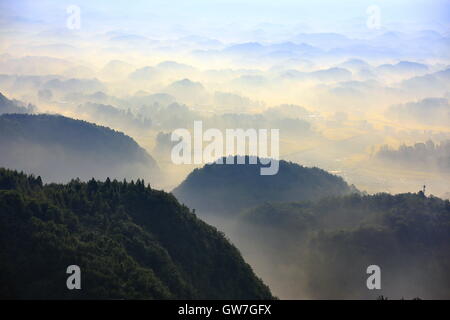 Lichuan, Lichuan, China. 13th Sep, Morning mist shrouds Qiyue Mountain ...