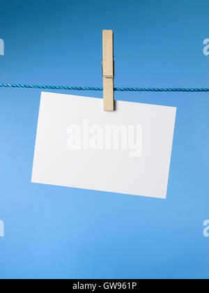 Washing Line with hanging blank paper Stock Photo - Alamy