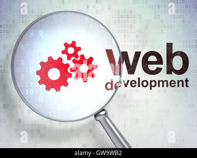 Web development concept: Gears and Website on computer keyboard ...