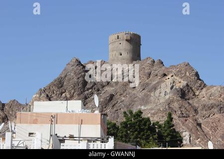 Historic tower in Muscat, Oman. An isolated towers trough rocks Stock ...