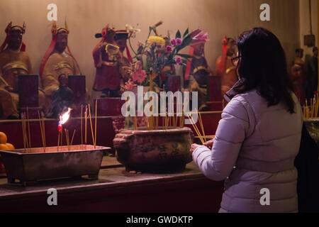 Chinese Prayer praying at Temple in Hong Kong Stock Photo: 118929487 ...