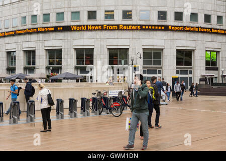 Thompson Reuters banner, Canary Wharf, London, UK Stock Photo - Alamy