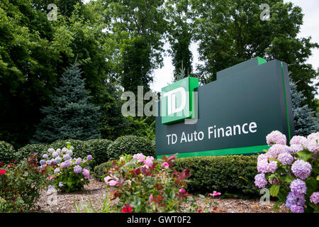A logo sign outside of the headquarters of TD Auto Finance in ...