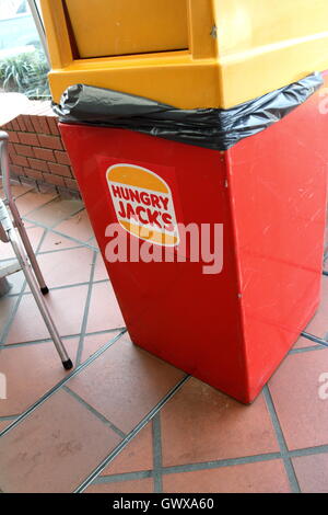 rubbish bin with fast food box inside Stock Photo - Alamy