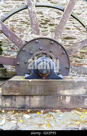 Axle of old water wheel with spokes projecting from it Stock Photo - Alamy