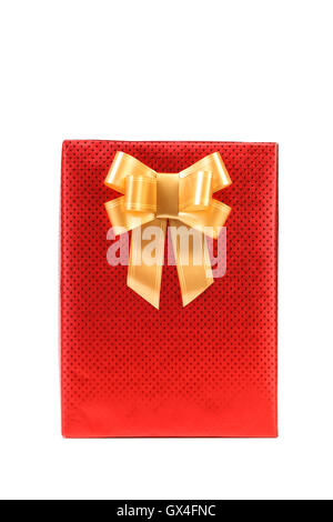 Red present box with spots and golden bow Stock Photo - Alamy
