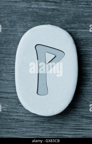 Wunjo Nordic stone rune on fur. Letter Wyn of the Viking alphabet Stock ...