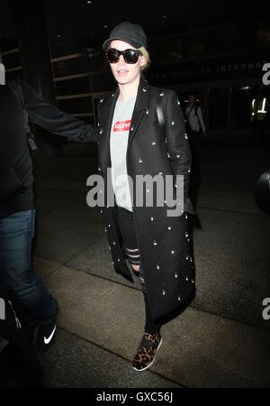 Iggy Azalea arriving at Los Angeles International Airport (LAX) wearing ...
