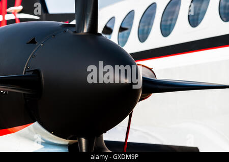 Spinner of a turbo-prop engine of a modern aircraft against the ...