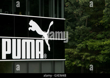 A logo sign outside of the headquarters of Puma North America, Inc., in ...