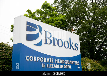 A logo sign outside of the headquarters of Brooks Automation in ...
