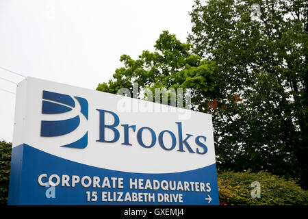 A logo sign outside of the headquarters of Brooks Automation in ...