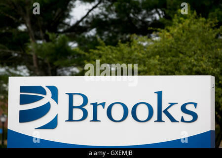 A logo sign outside of the headquarters of Brooks Automation in ...