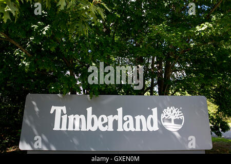 A logo sign outside of the headquarters of The Timberland Company in ...