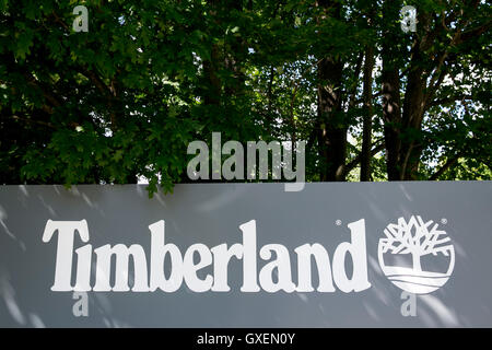 A logo sign outside of the headquarters of The Timberland Company in ...