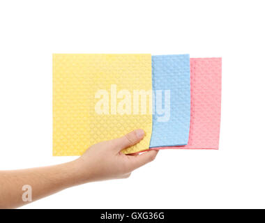 Hand holds different sponges Stock Photo - Alamy