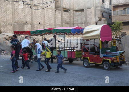 Syrians celebrating Eid al-Adha in spite of the war Stock Photo - Alamy