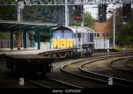 DRS class 66 locomotive departing from Inverness with the Inverness ...