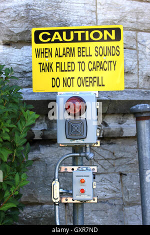 Oil tank overfill alarm system Stock Photo - Alamy