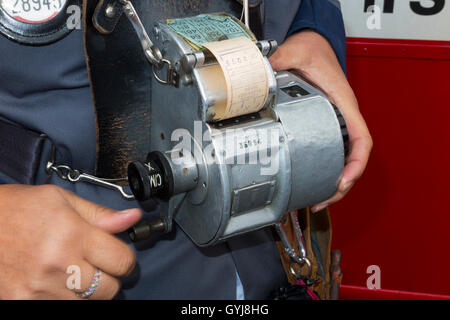 London Transport ticket machine used by bus conductor issuing tickets ...