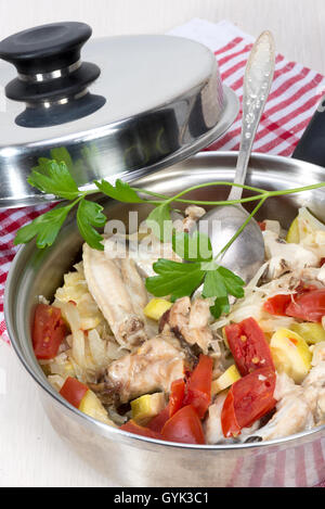 chicken meat with vegetables, stew meat in tagine Stock Photo - Alamy