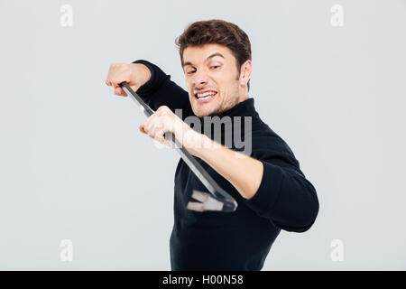 Thief or burglar man hand holding crowbar Stock Photo: 56918811 - Alamy