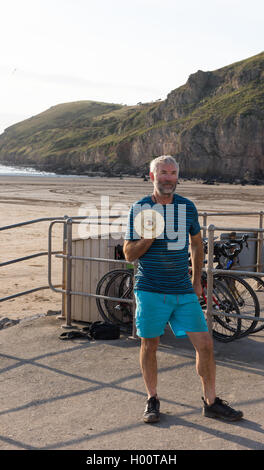 Metal railing on the cliff top above Mundesley beach Stock Photo - Alamy