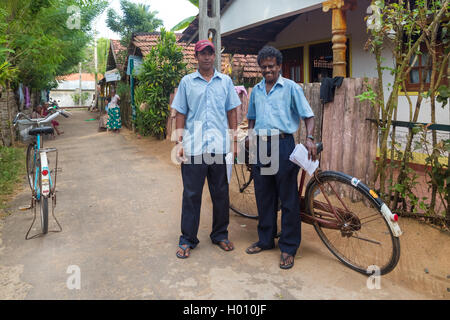 Postman delivering letters in the local cafeneon, Proastio, near Stock ...