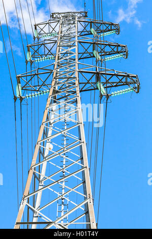 Lattice-type steel tower as a part of high-voltage line. Overhead power ...