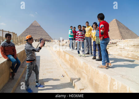 CAIRO, EGYPT - FEBRUARY 1, 2016: Group of local boys posing in front of ...