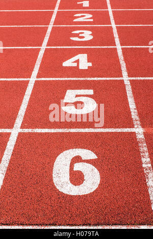 Running track with the numbers from one to six Stock Photo - Alamy