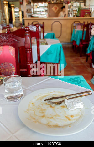 Messy dining room, table with plate and glasses after lunch Stock Photo ...