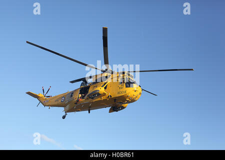 An RAF sea king helicopter of C flight 22 squadron RAF Valley over ...