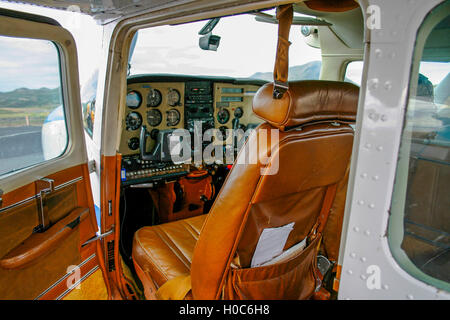 Inside passenger airplane with cockpit door open before takeoff Stock ...