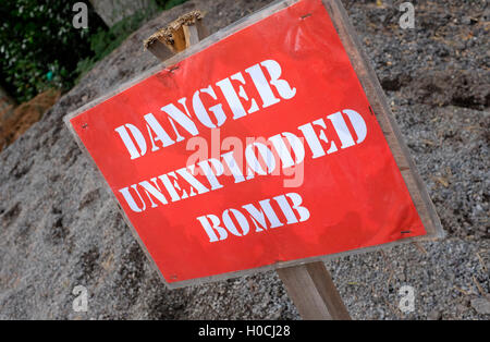 Danger Unexploded Bomb sign Stock Photo - Alamy