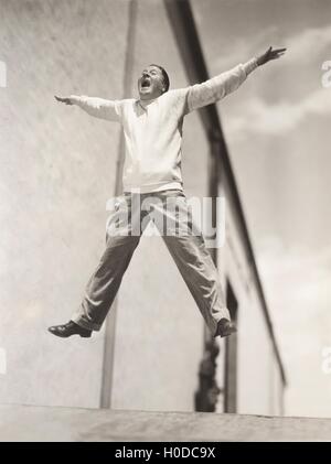 adult man is jumping for joy Stock Photo - Alamy