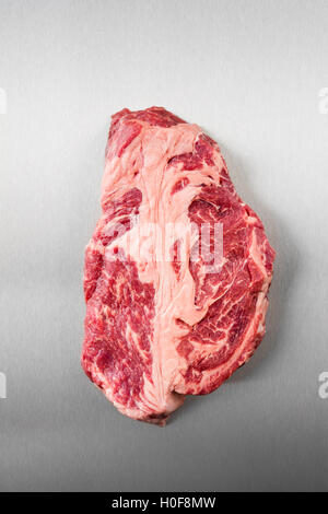 Overhead view of raw chuck eye steak isolated on white Stock Photo - Alamy