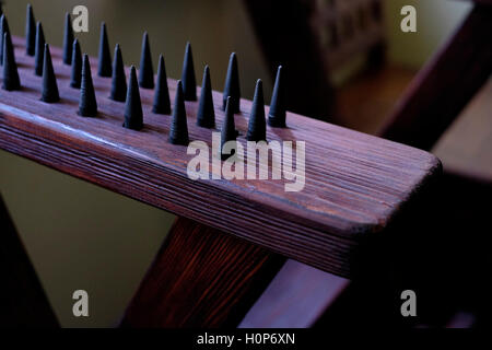A Medieval torture chair which pierced a person’s body at every point ...