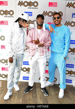 (left to right) Akelle Charles, Haile and Louis Rei of WSTRN attending ...