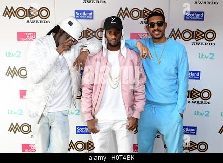 (left to right) Akelle Charles, Haile and Louis Rei of WSTRN attending ...