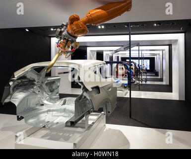 Display of modern car manufacture and assembly production line at VW ...