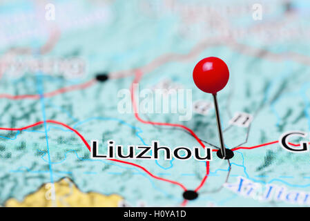 Close up to a Liuzhou city with a red pin needle into China country ...