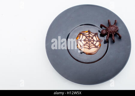 waffle with chocolate spider web Stock Photo - Alamy