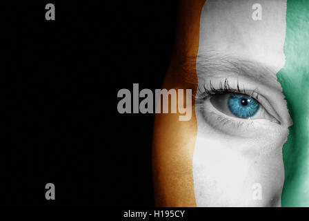 Cote D'Ivoire national flag on top view work space of creative designer ...