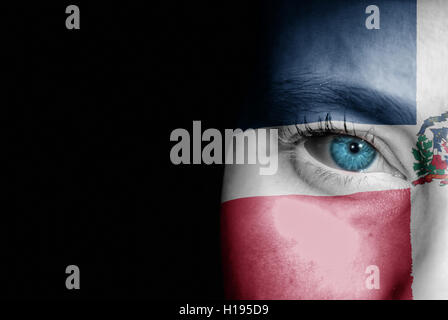 Human face painted with flag of Dominican Republic Stock Photo - Alamy