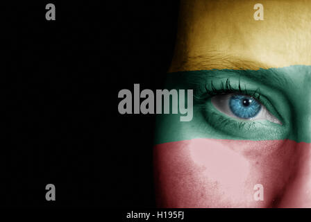 Human face painted with flag of Lithuania Stock Photo - Alamy
