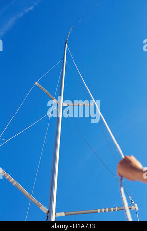 Preparation of the mainsail halyard Stock Photo - Alamy